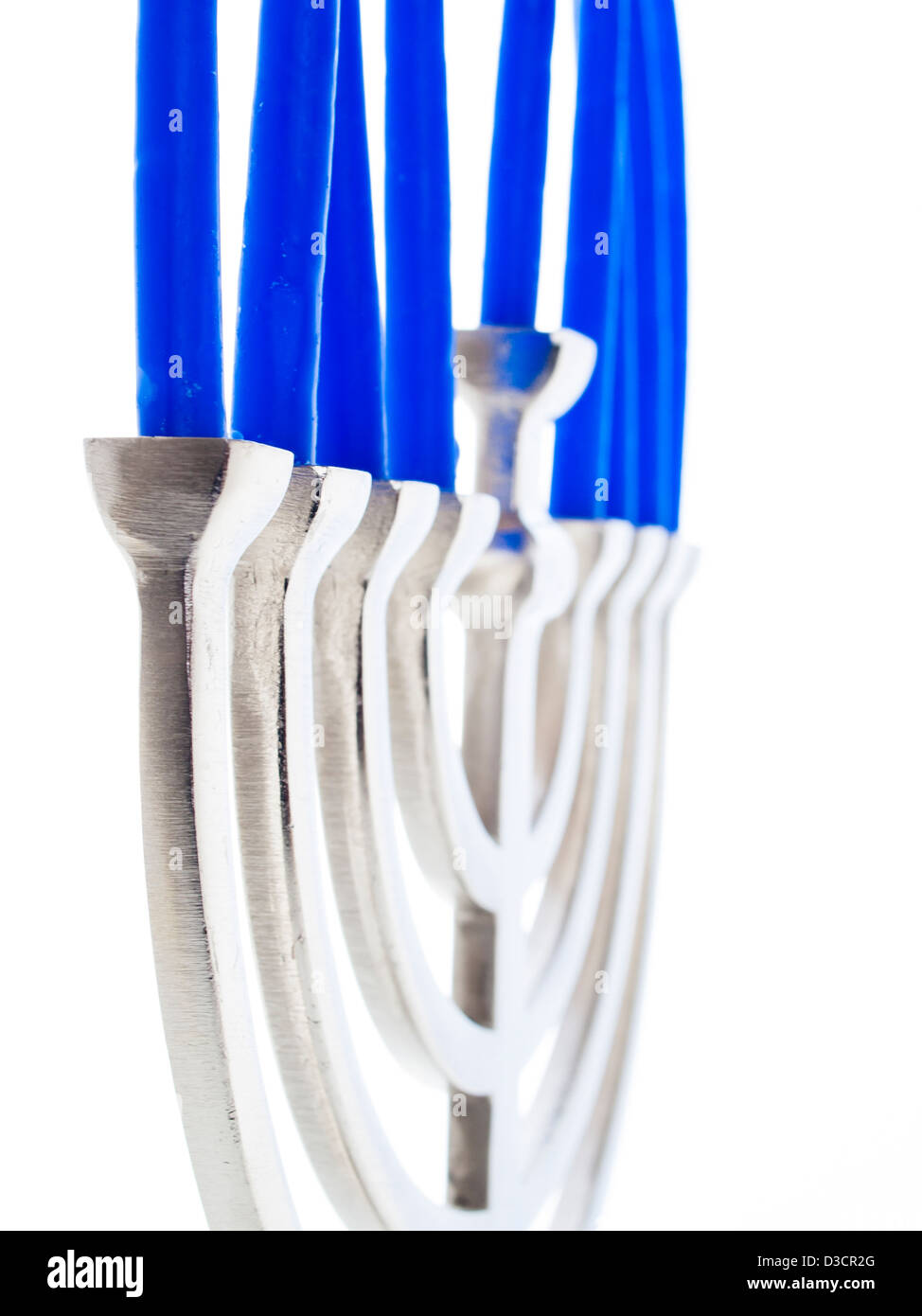 Contemporary menorah with blue candels on white background Stock Photo ...