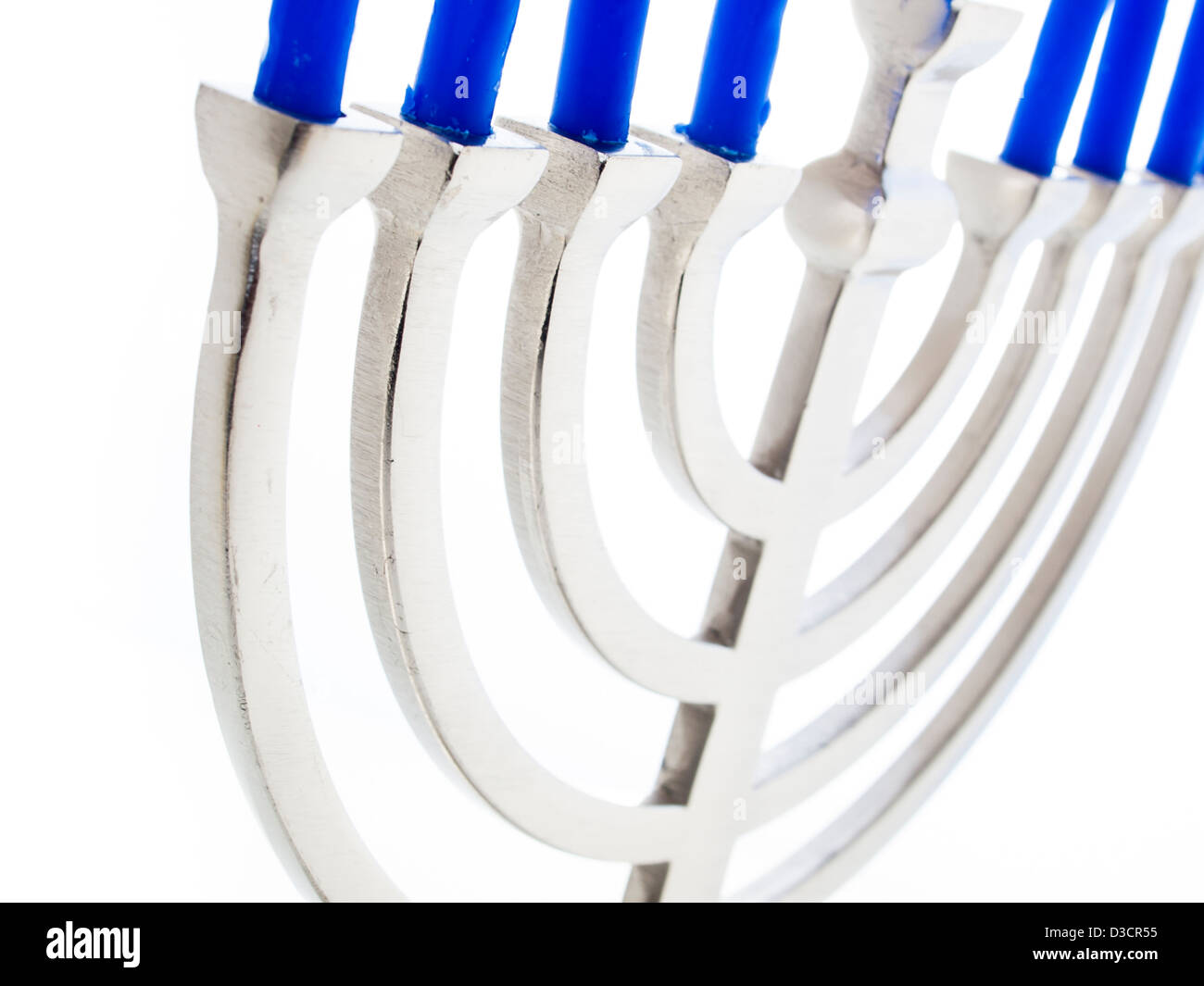 Contemporary menorah with blue candels on white background Stock Photo ...