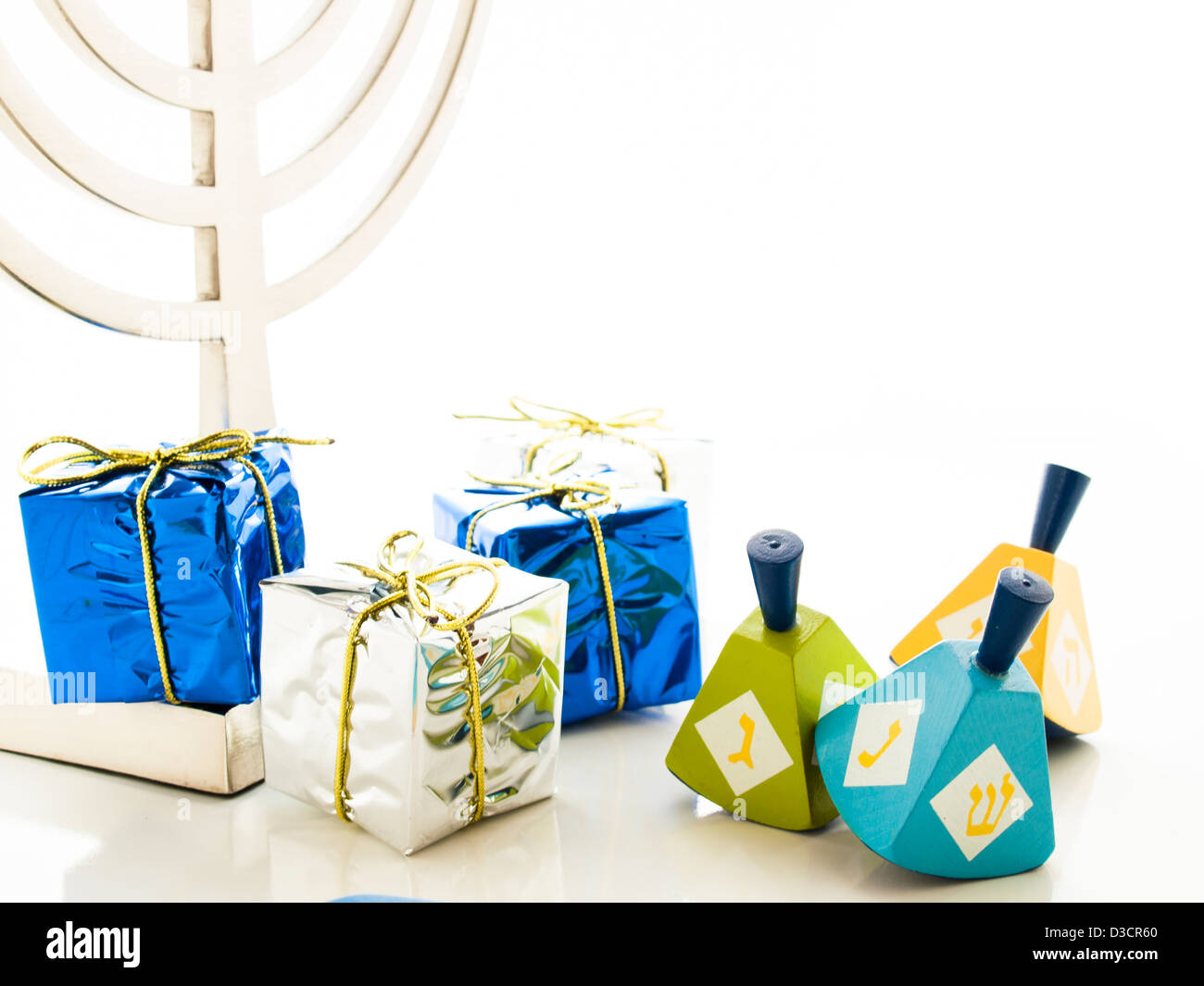 Colorful dreidels on white background Stock Photo - Alamy