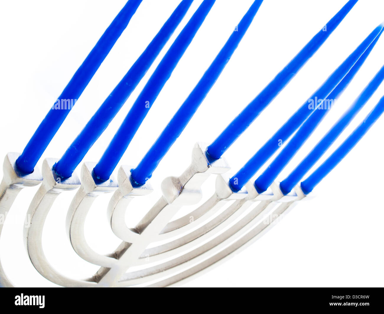 Contemporary menorah with blue candels on white background Stock Photo ...