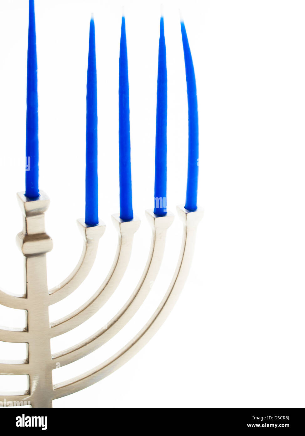Contemporary menorah with blue candels on white background Stock Photo ...