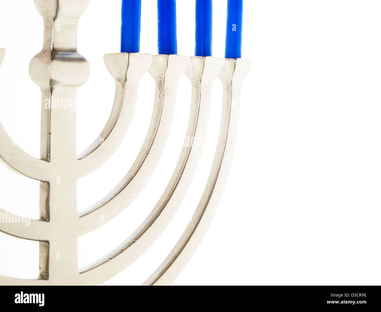 Contemporary menorah with blue candels on white background Stock Photo ...