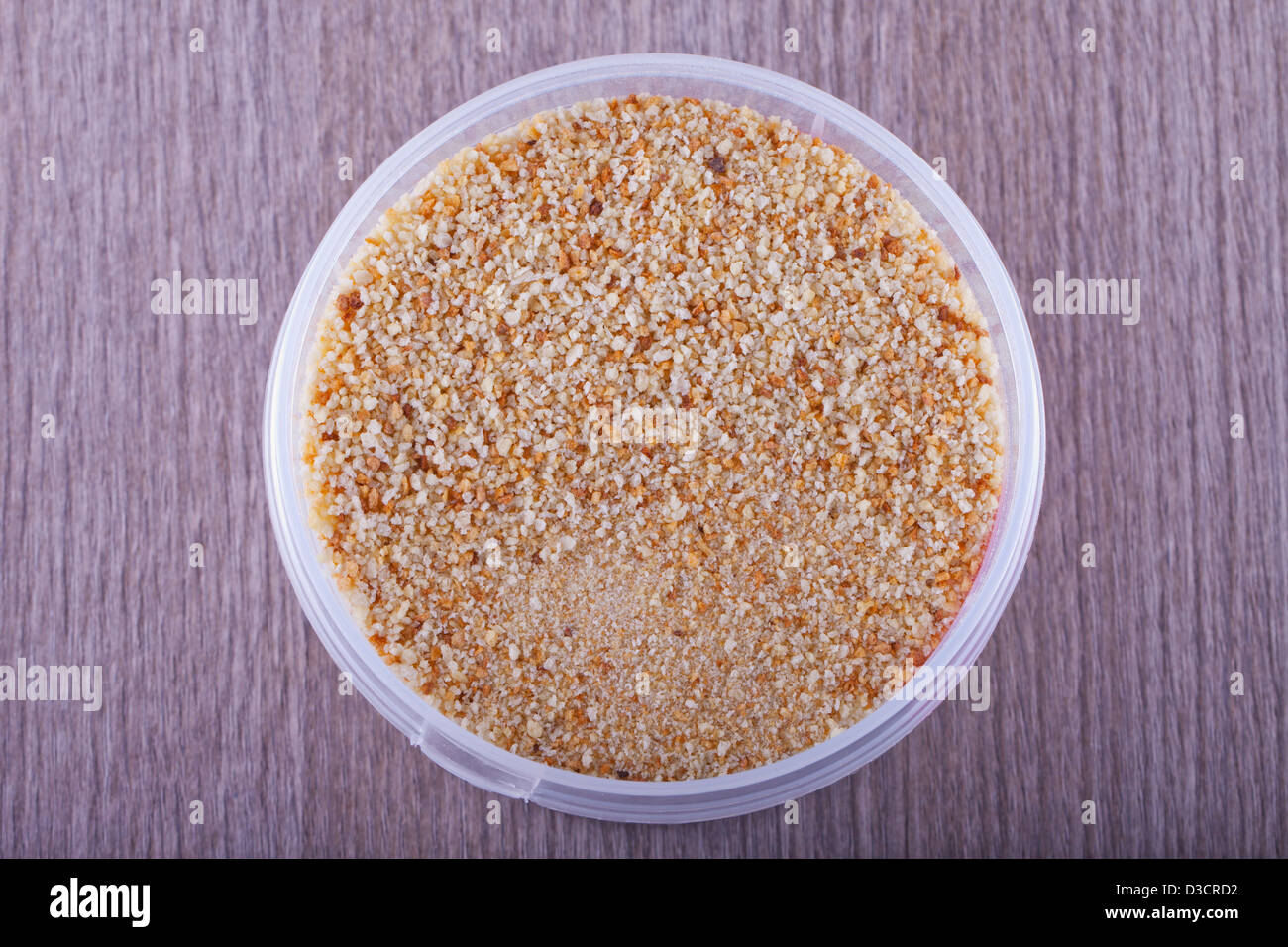 Close up of a barrel full of bread crumbs Stock Photo - Alamy