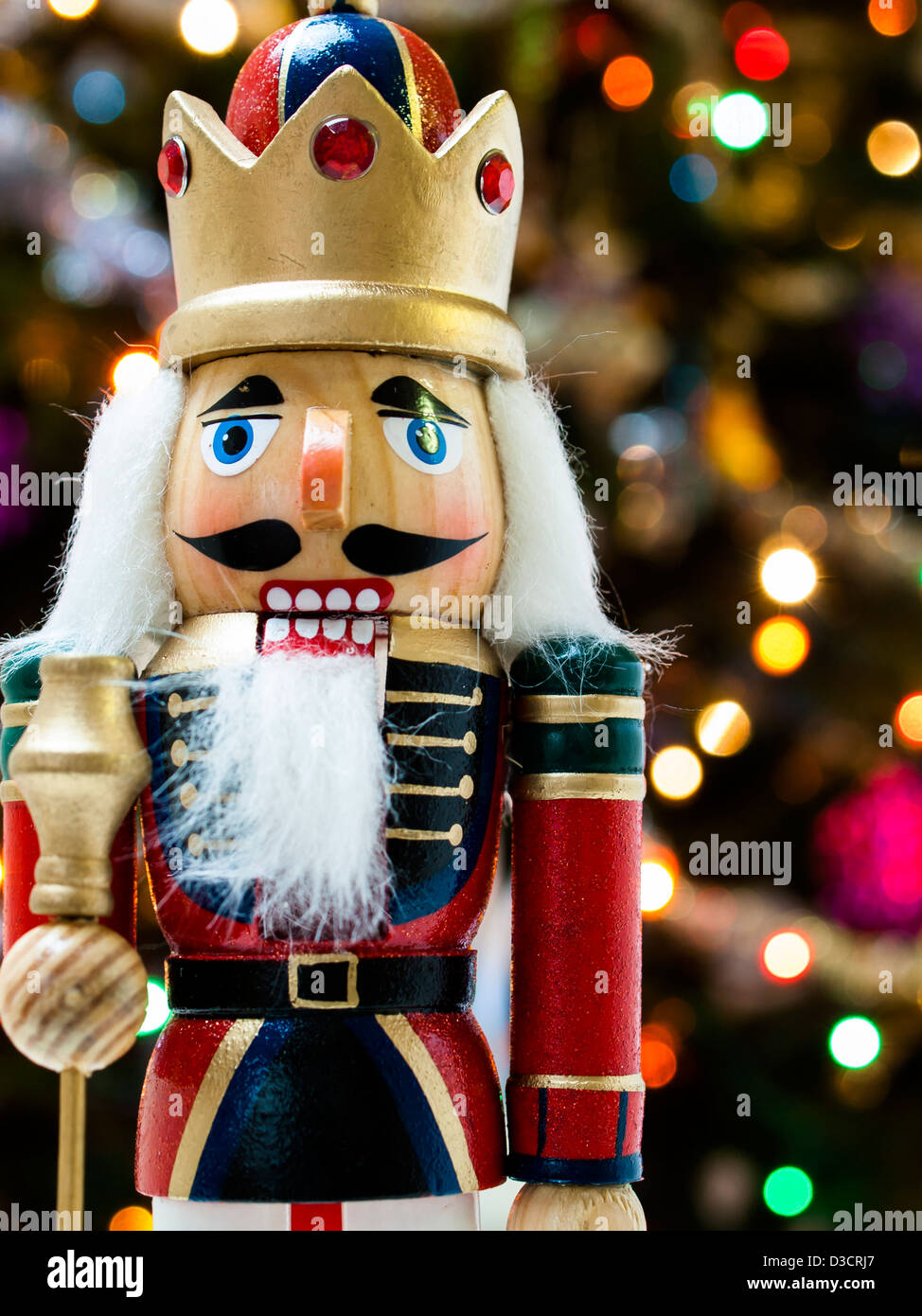 Nutcracker with Christmas tree in the backgound Stock Photo - Alamy