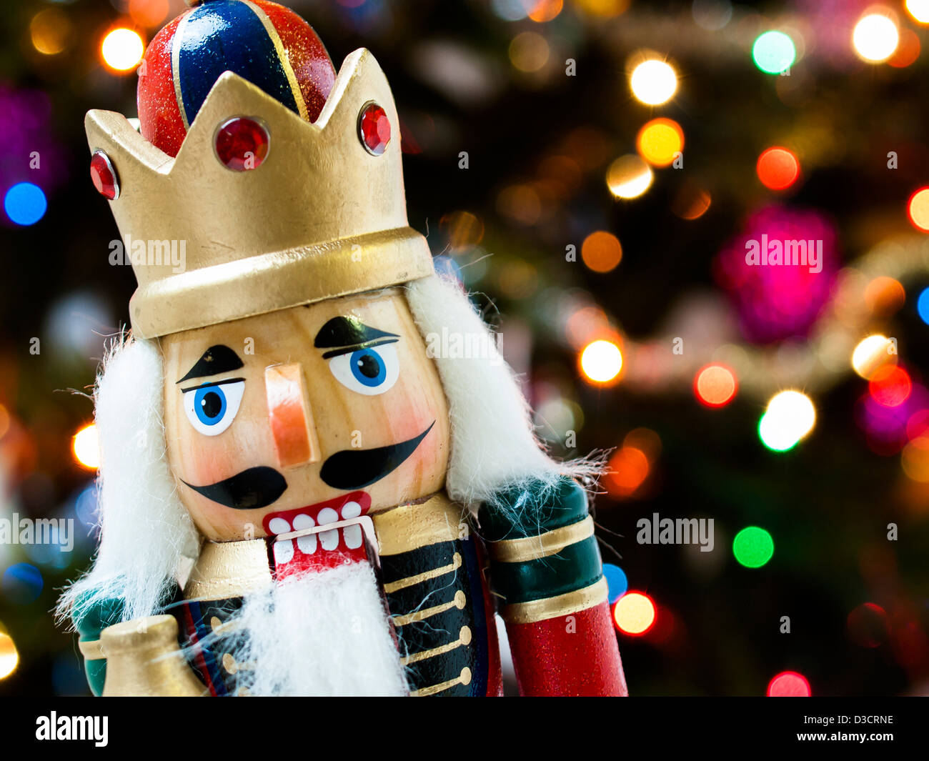 Nutcracker with Christmas tree in the backgound Stock Photo - Alamy