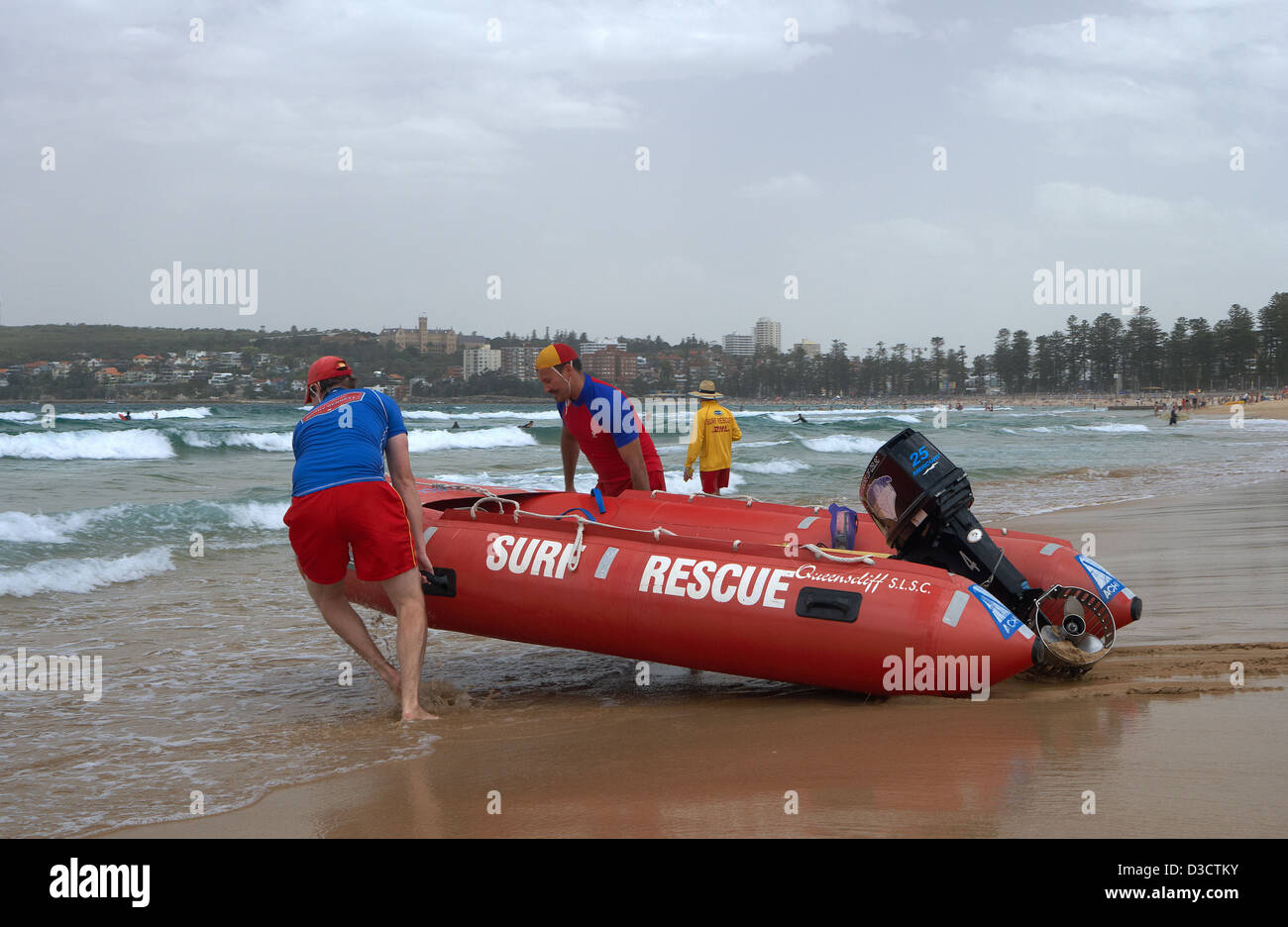Sydney, Australia, lifeguards on the beach with their boat from Manly ...