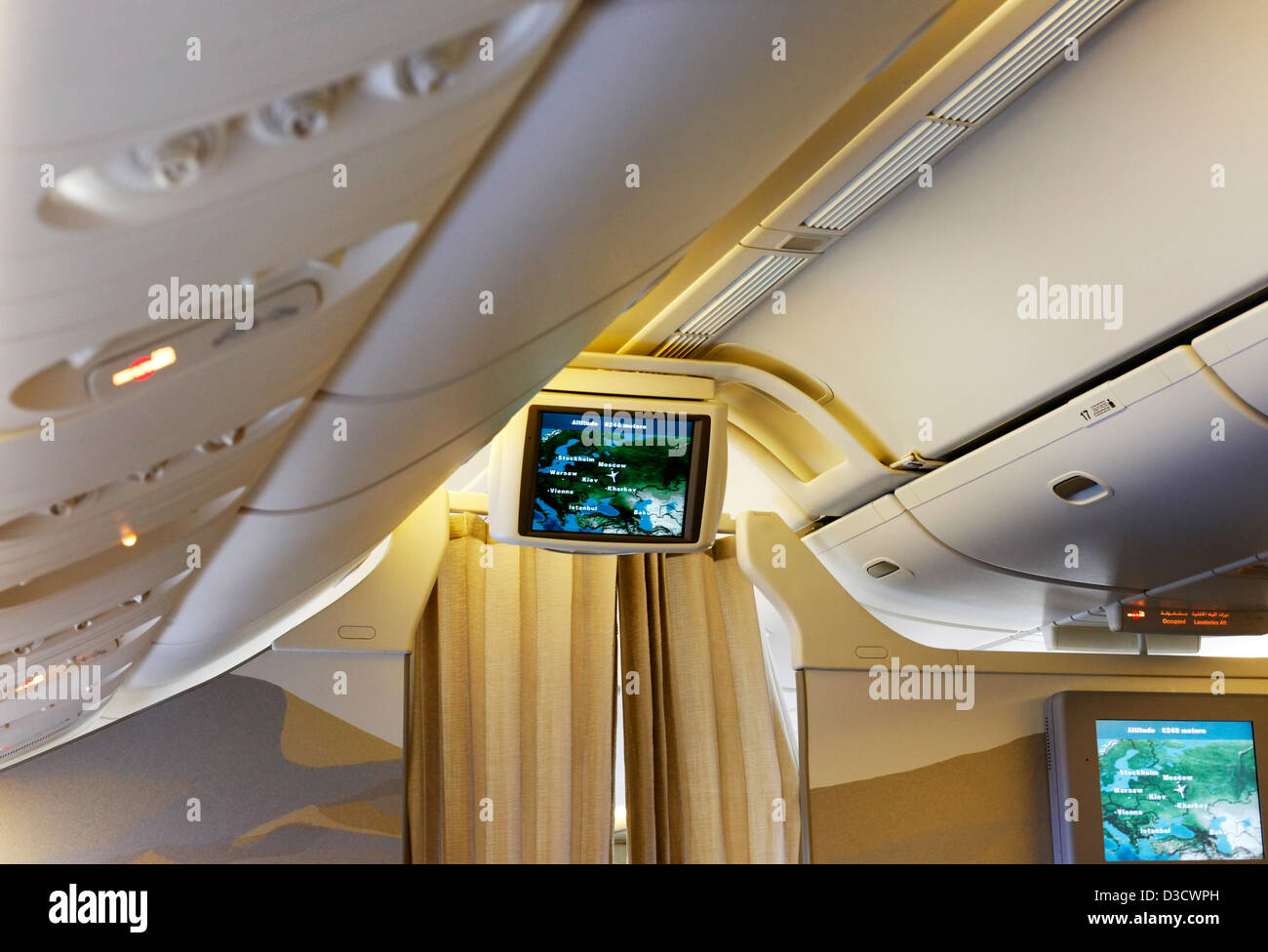 The monitor in interior of the plane Stock Photo - Alamy