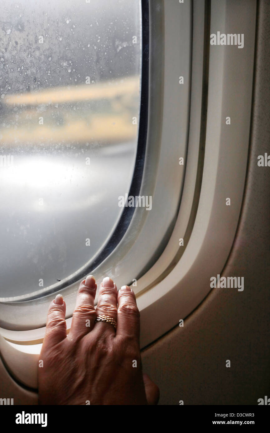 Airplane passenger hand hi-res stock photography and images - Alamy