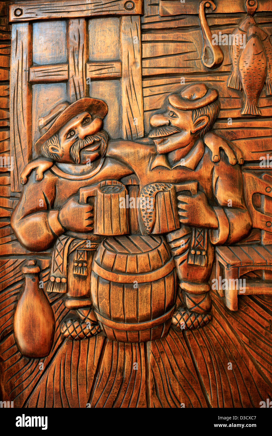 funny story about drinking carved on a tree Stock Photo - Alamy
