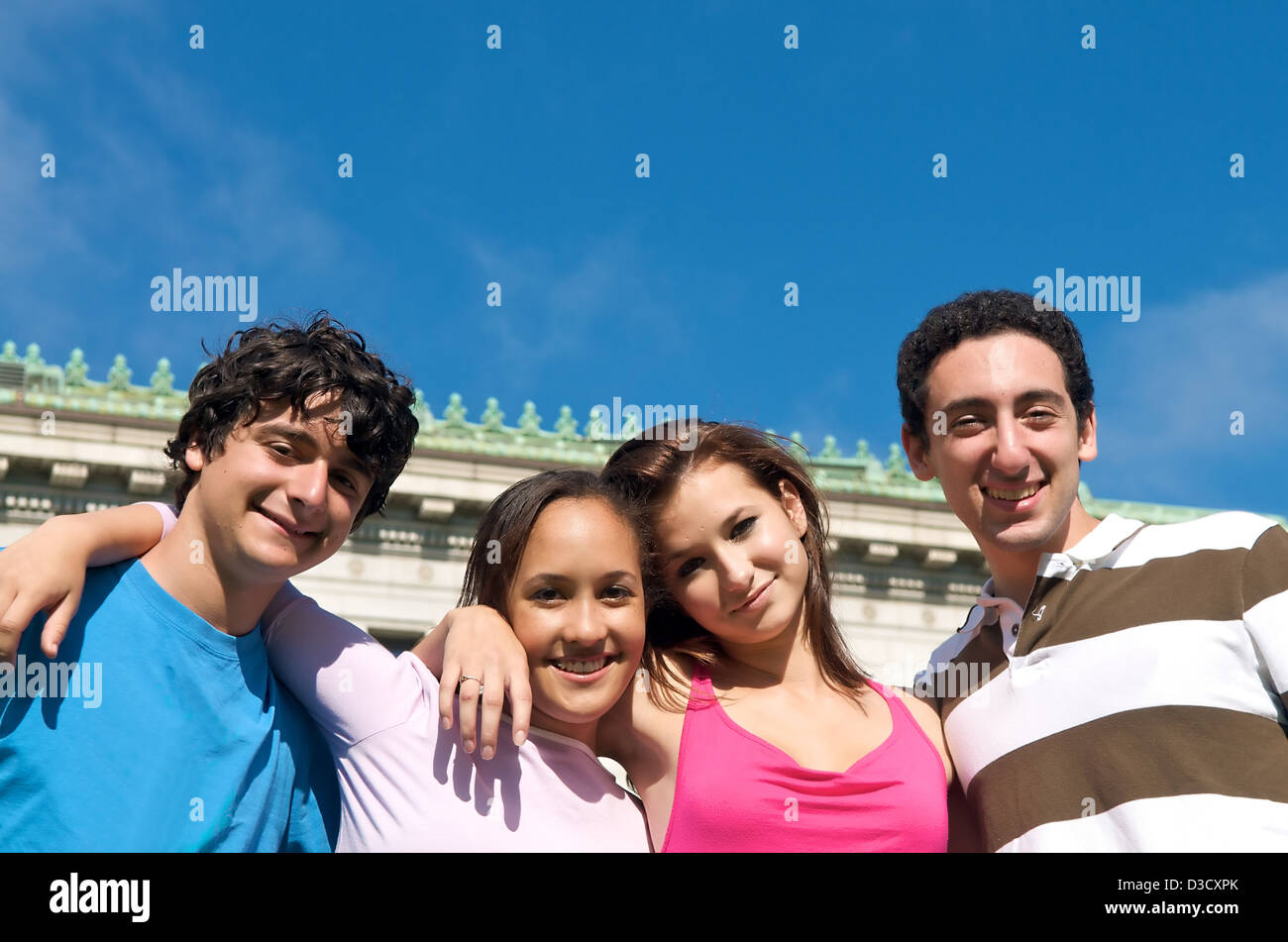 High School friend under blue sky Stock Photo - Alamy