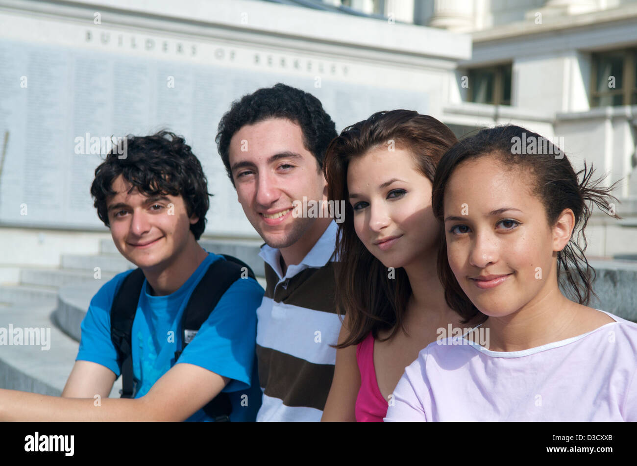 Group of 4 friends outdoor Stock Photo - Alamy