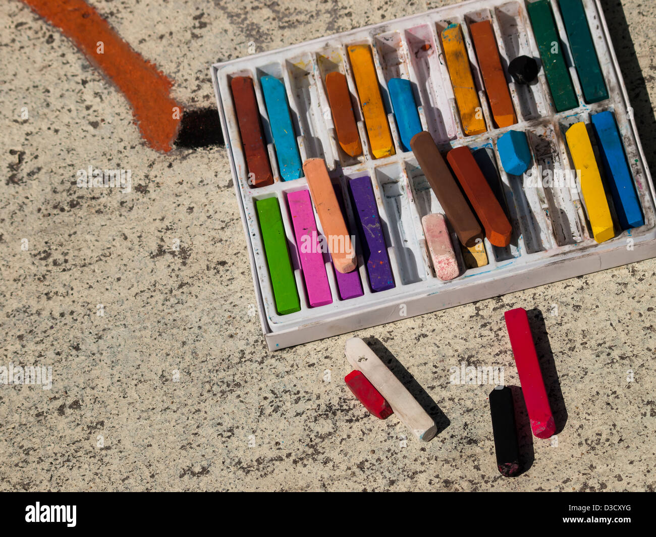 Chalks on the street during Chalk Art Festival in Denver, Colorado ...