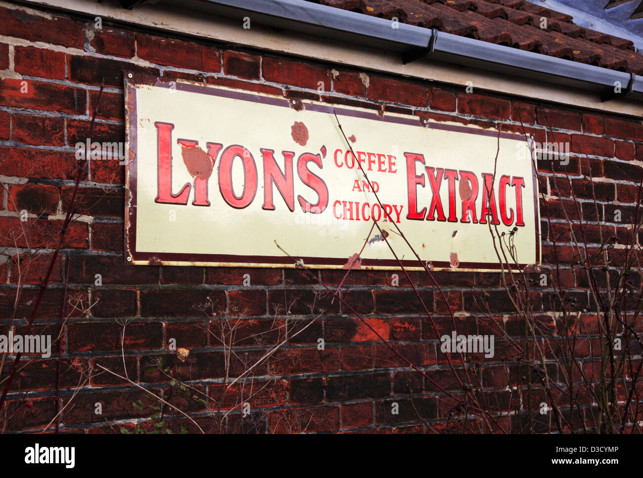 An old enamel advertising sign at Acle railway station, Norfolk ...