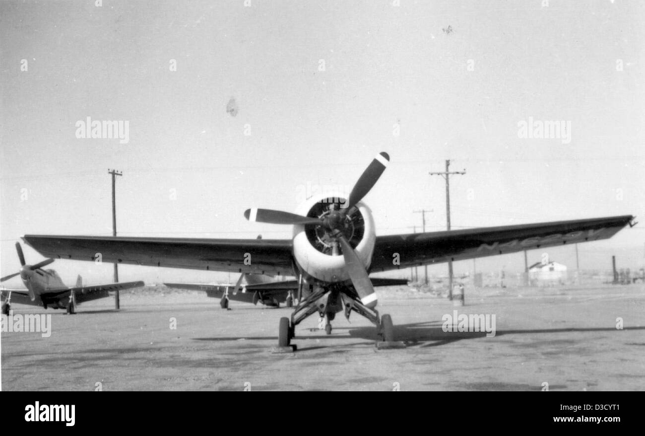 This image features a General Motors FM-2 Wildcat, a naval fighter ...