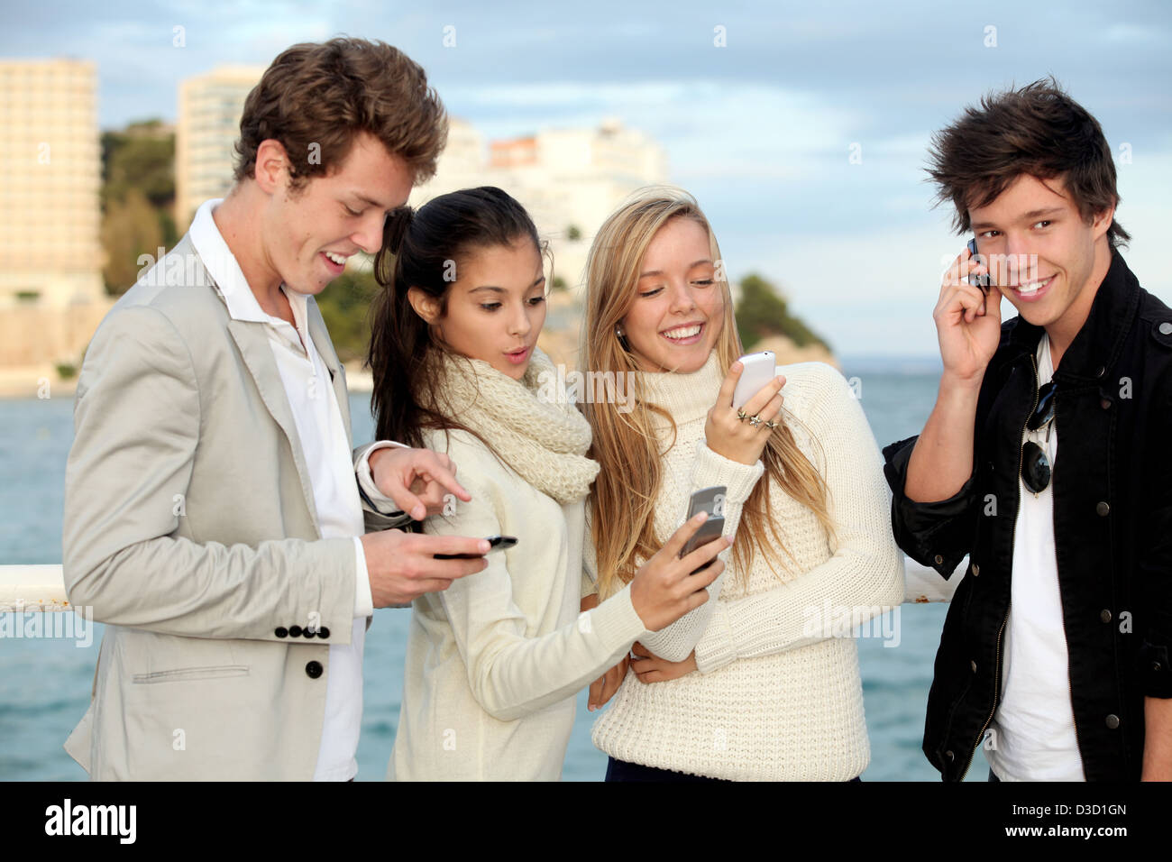 Teens All On Mobile Phones High Resolution Stock Photography and Images ...