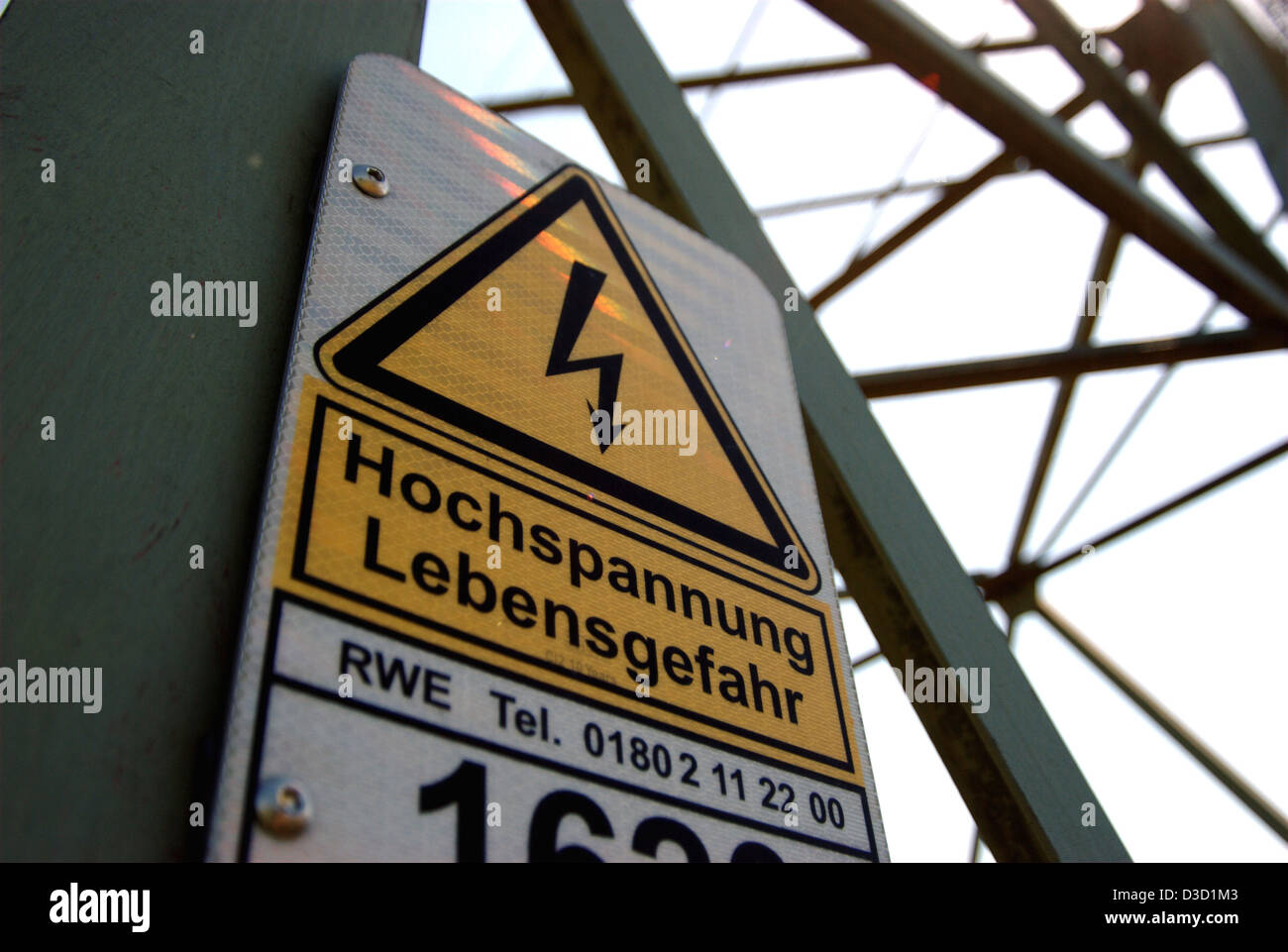 Muenster, Germany, sign on a utility pole warning of high voltage Stock ...