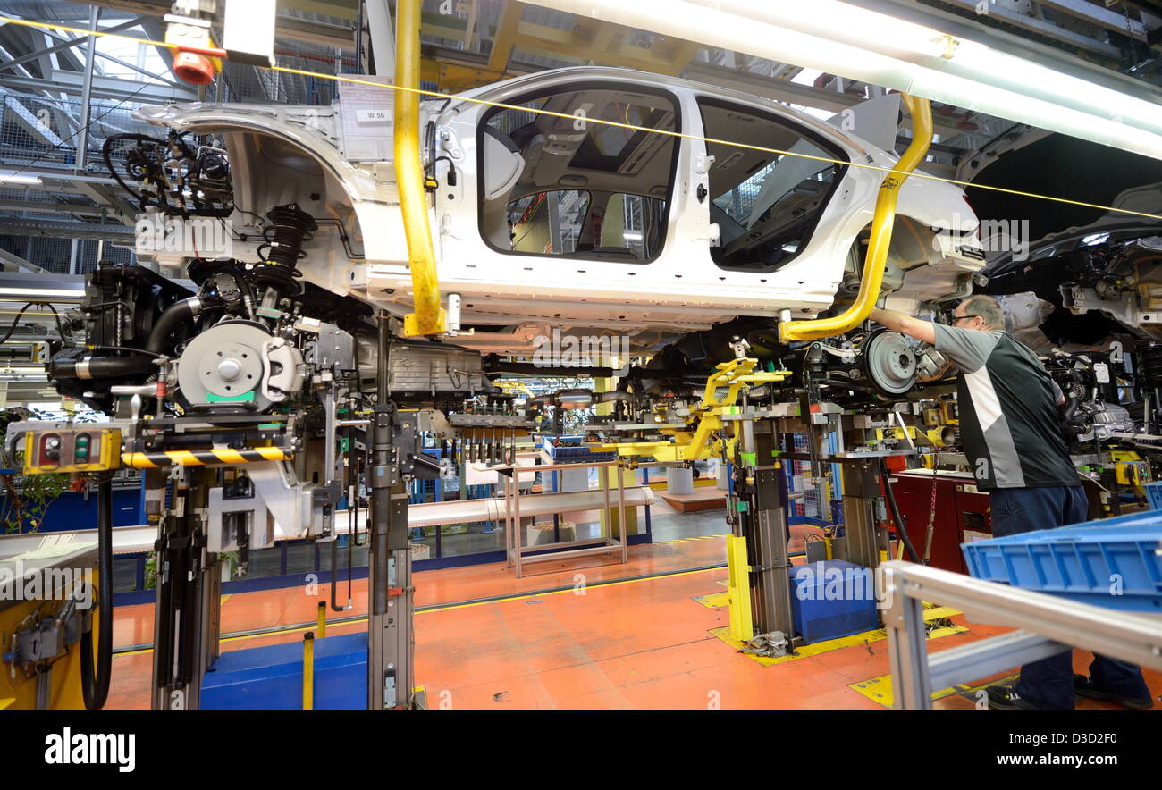 Workers put together a Mercedes C-Class on production lines at the ...