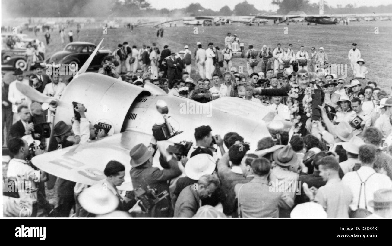 The Pesco Special, an iconic air racer, is seen here surrounded by fans ...