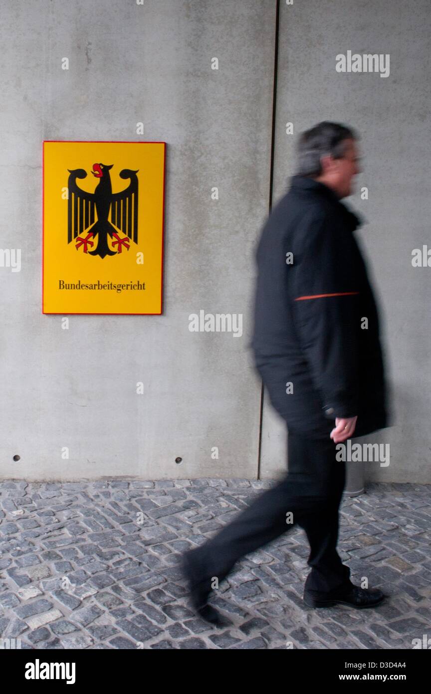 A man walks through the entrance of the German Federal Labour Court in ...