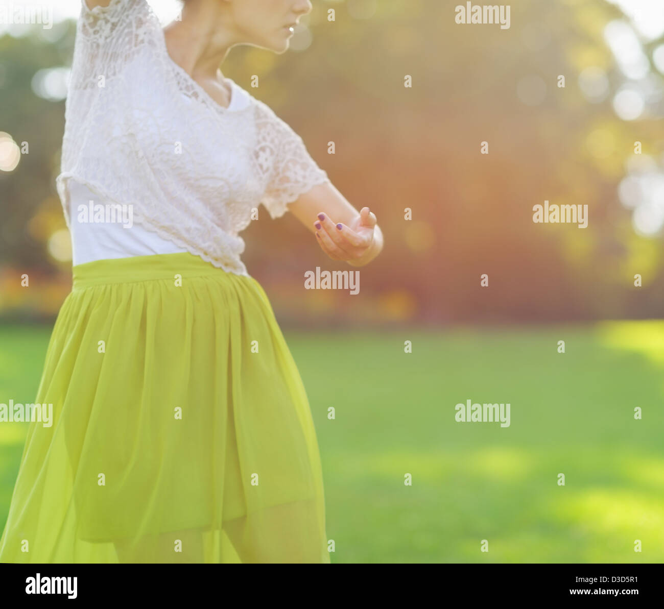 Closeup on girl dancing on meadow Stock Photo - Alamy