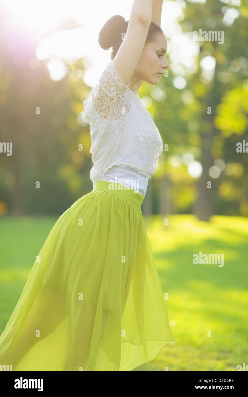 Woman outside dancing tree hi-res stock photography and images - Alamy