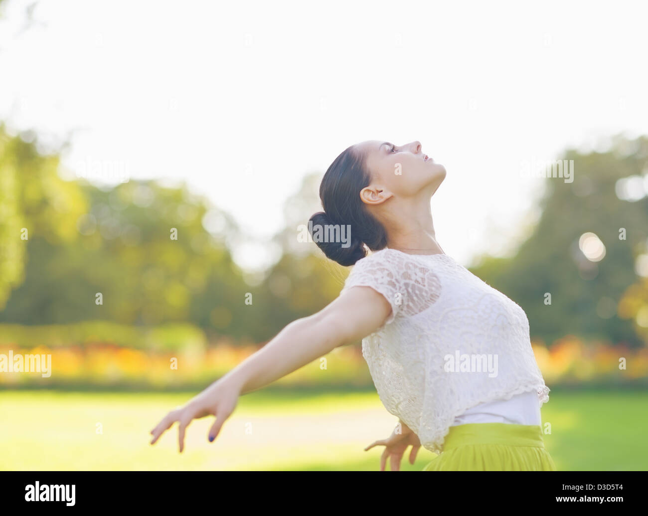 Girl enjoying spring outdoors Stock Photo - Alamy