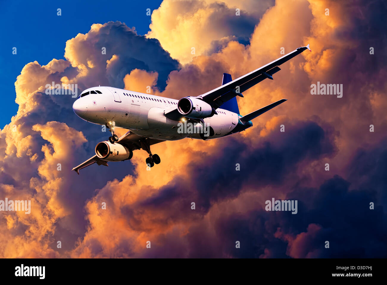 Jet aircraft in a sunset sky Stock Photo - Alamy