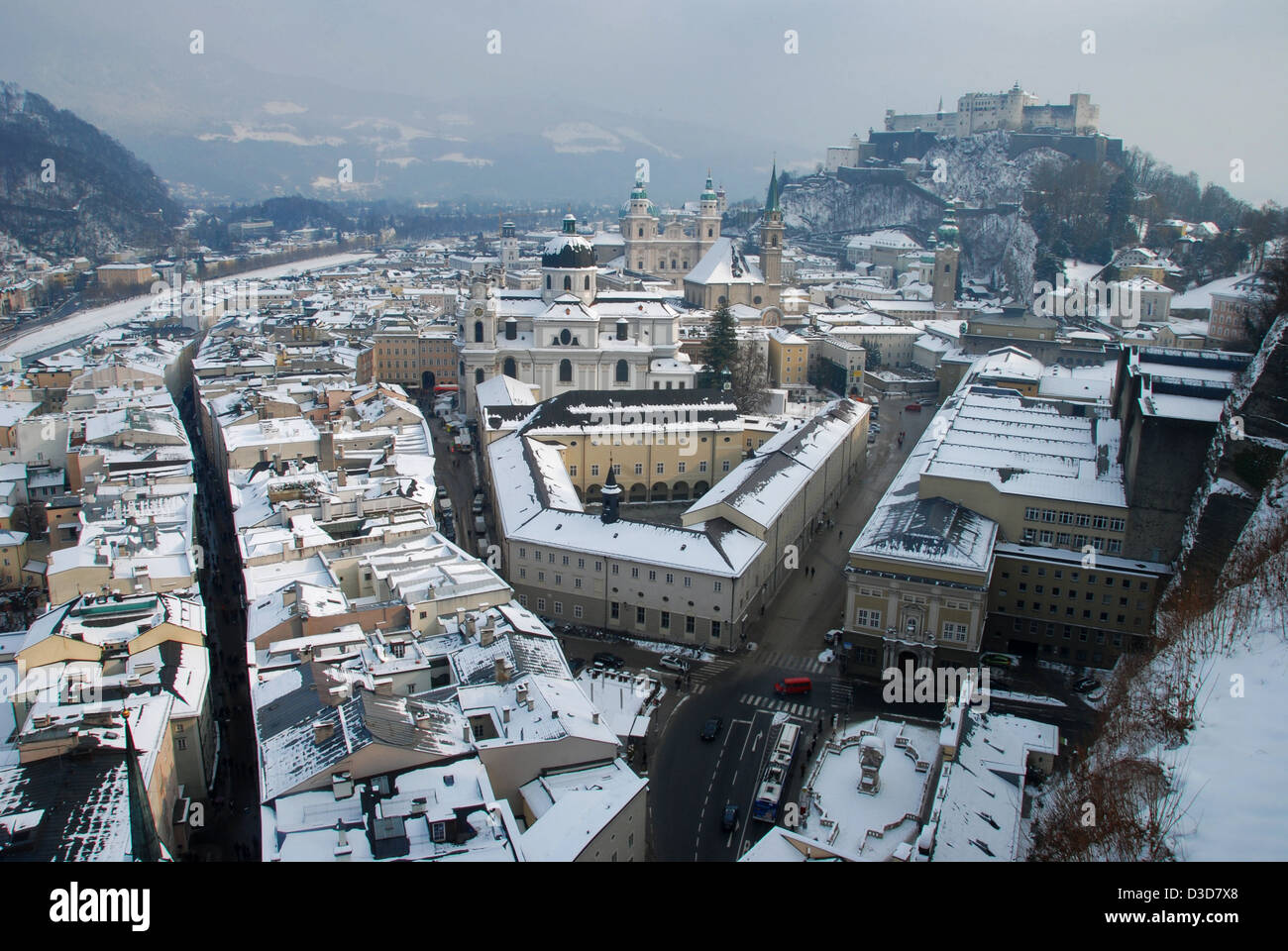 The Old Town of Salzburg in the snow, with the castle on the hill Stock ...