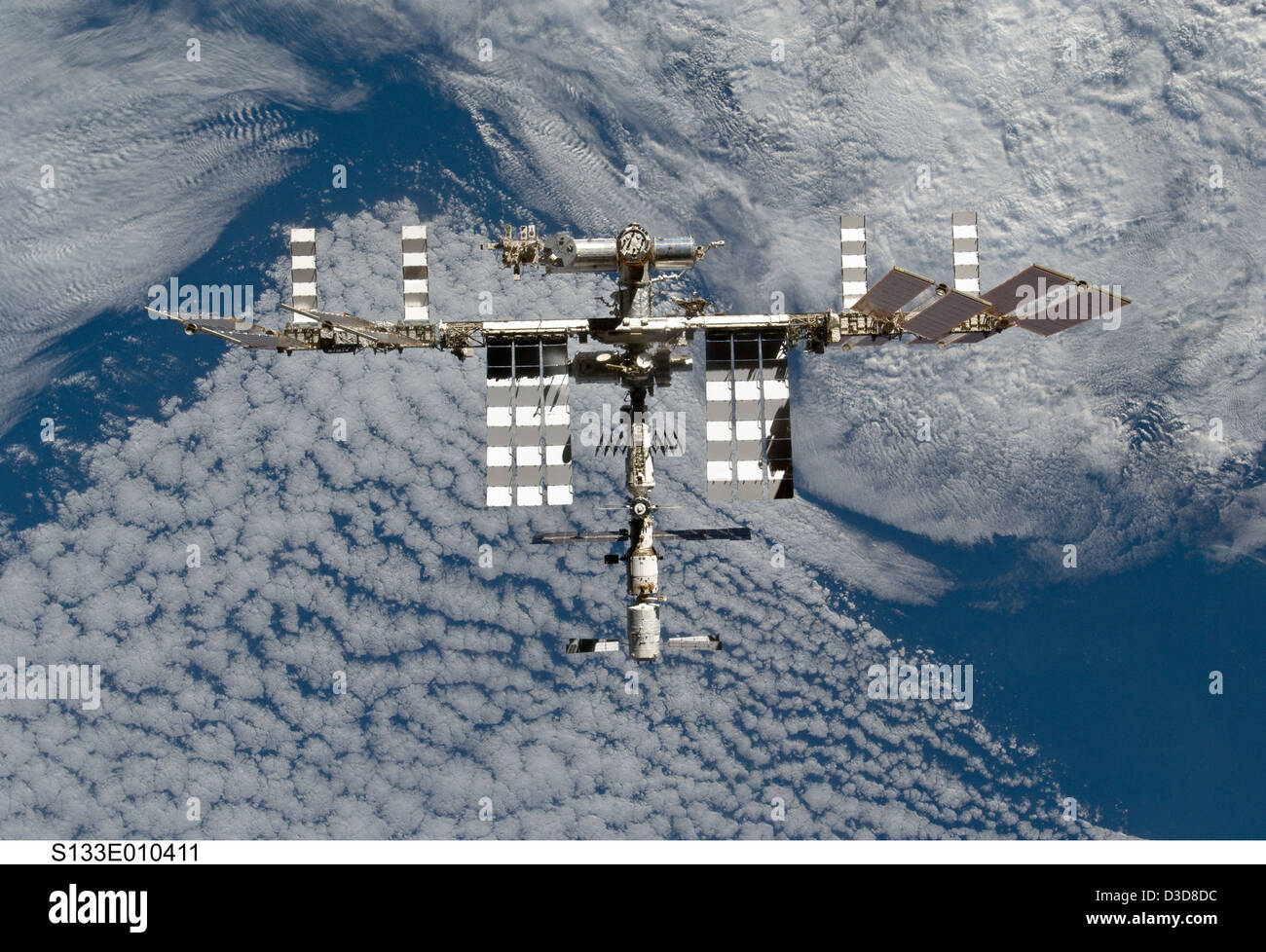 A photo taken from the International Space Station shows Earth below ...