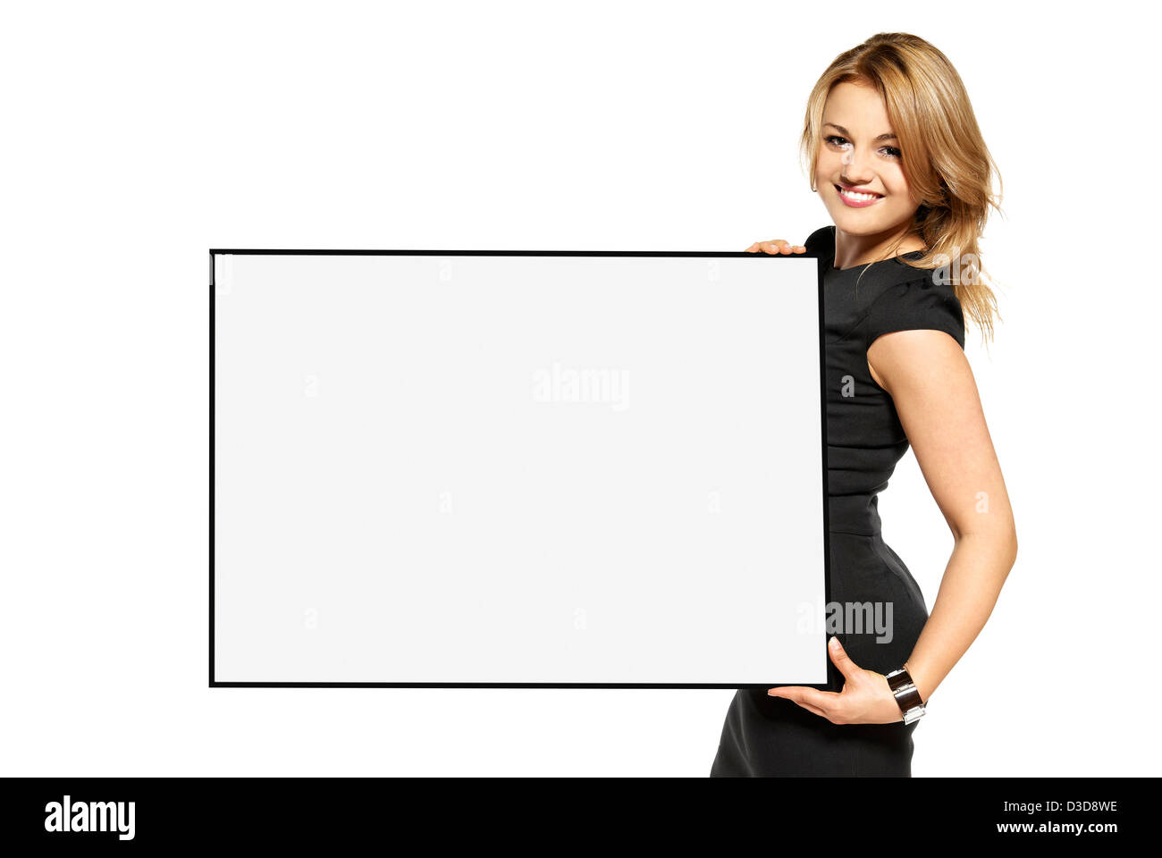 Attractive young woman holding up a poster. Isolated on white ...