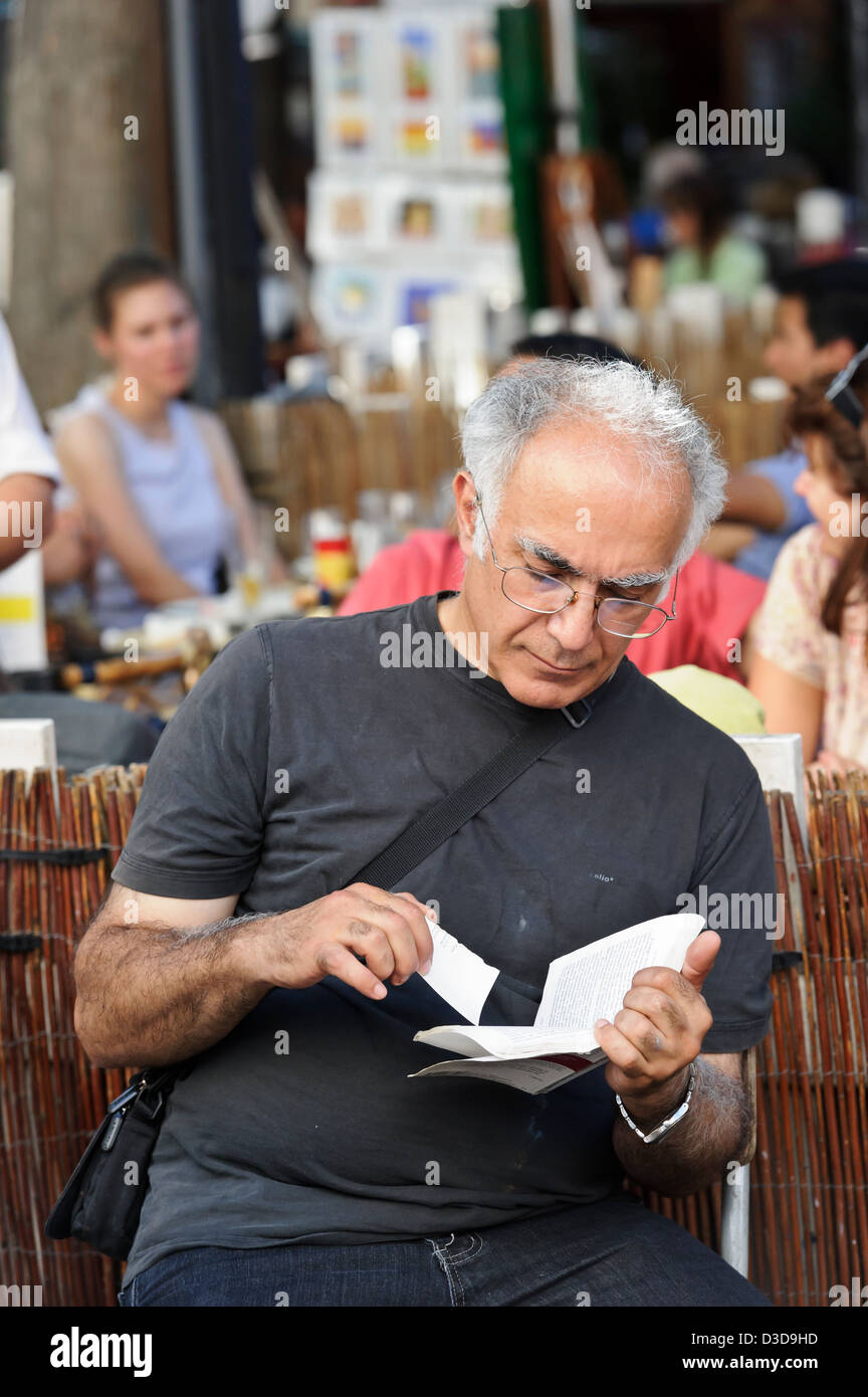 French man reading book hi-res stock photography and images - Alamy