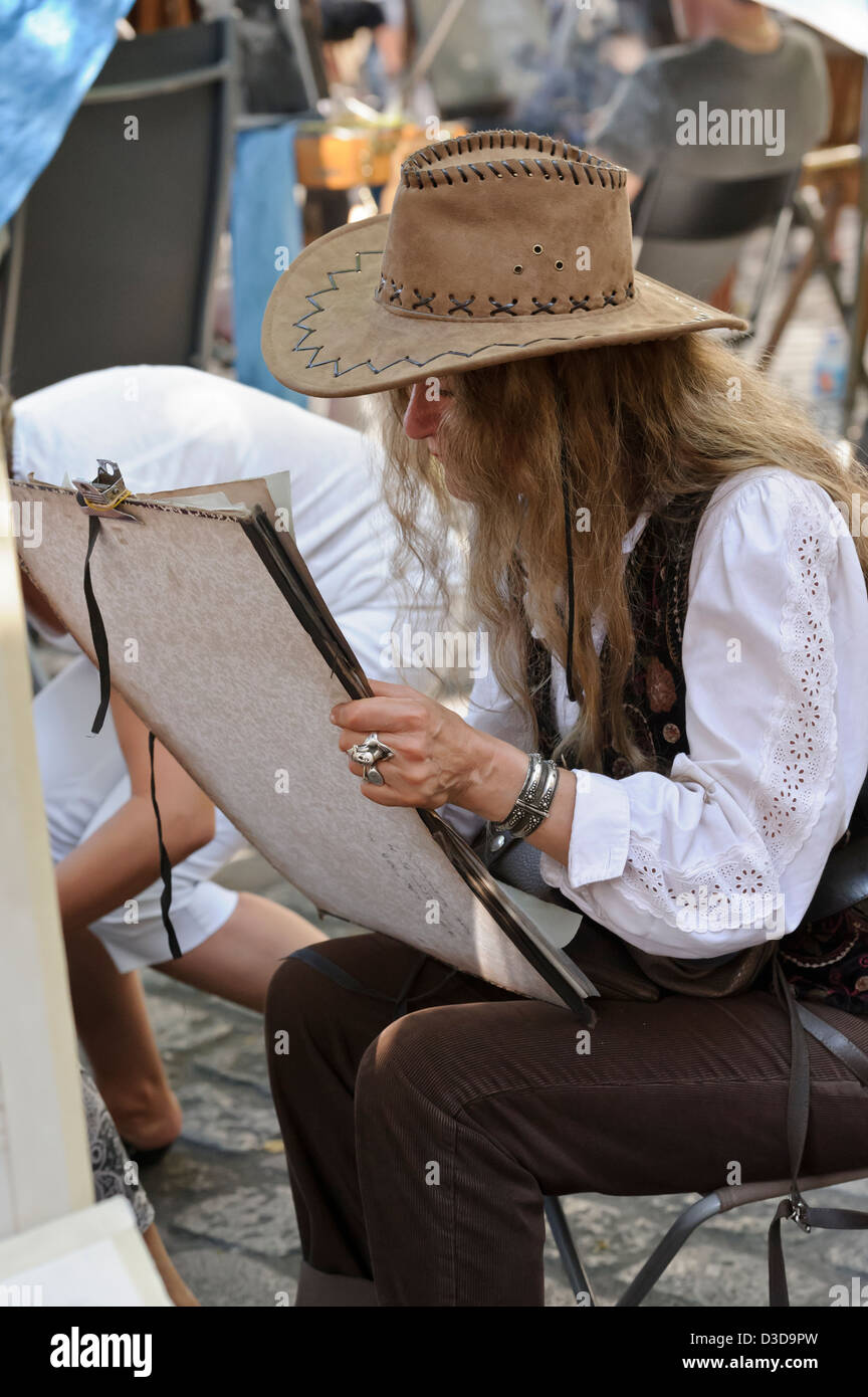 Artist at work in the 'Artist Quarters' in Montmartre, Paris, France ...