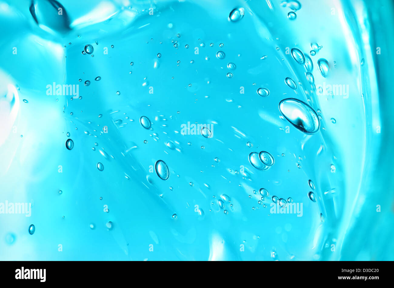 Bubbles in abstract blue gel Stock Photo - Alamy