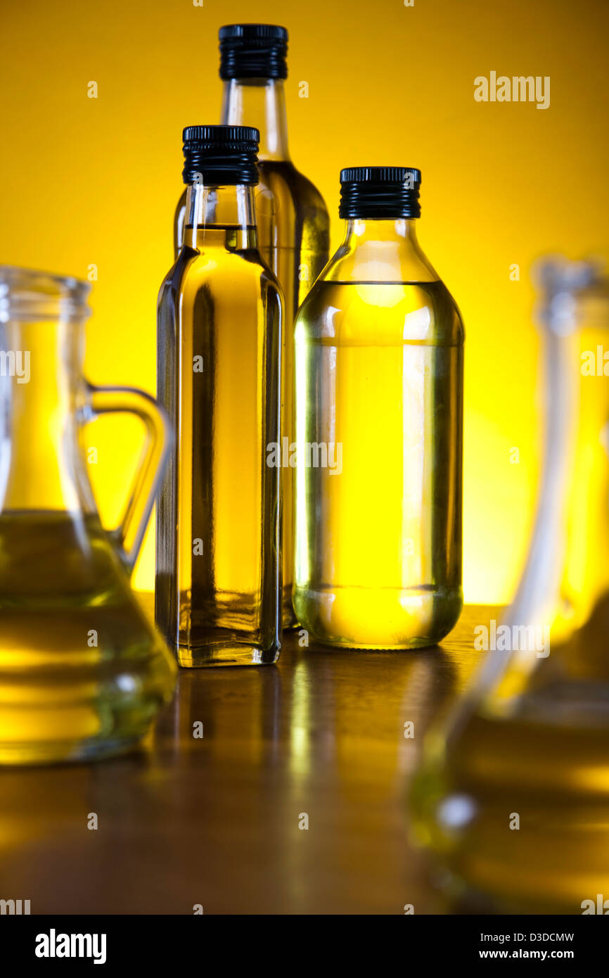 Glass bottle of premium virgin olive oil Stock Photo - Alamy
