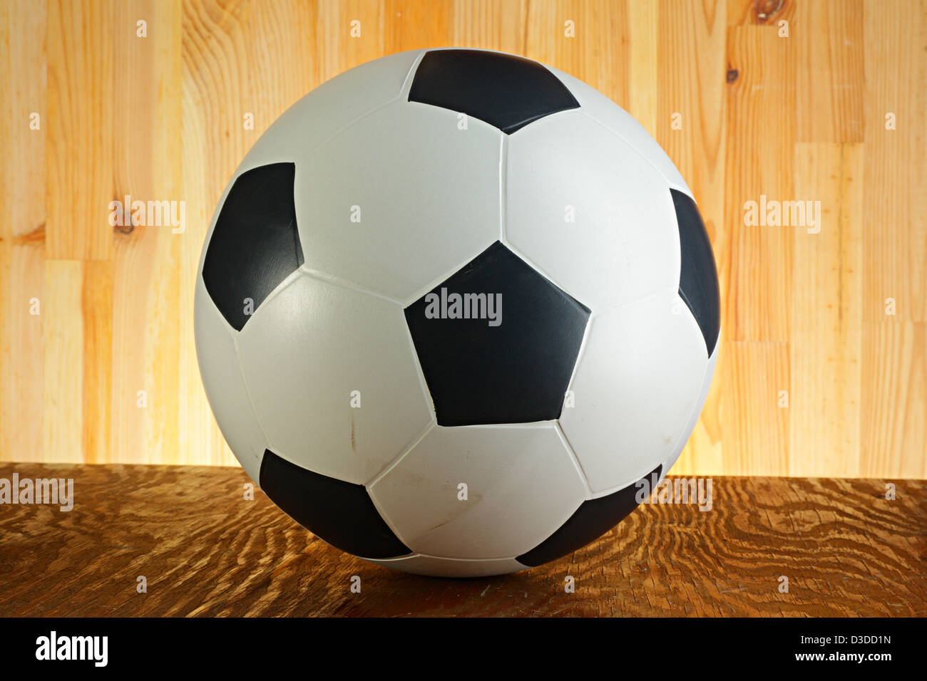 Ball on a abstract wooden background Stock Photo - Alamy