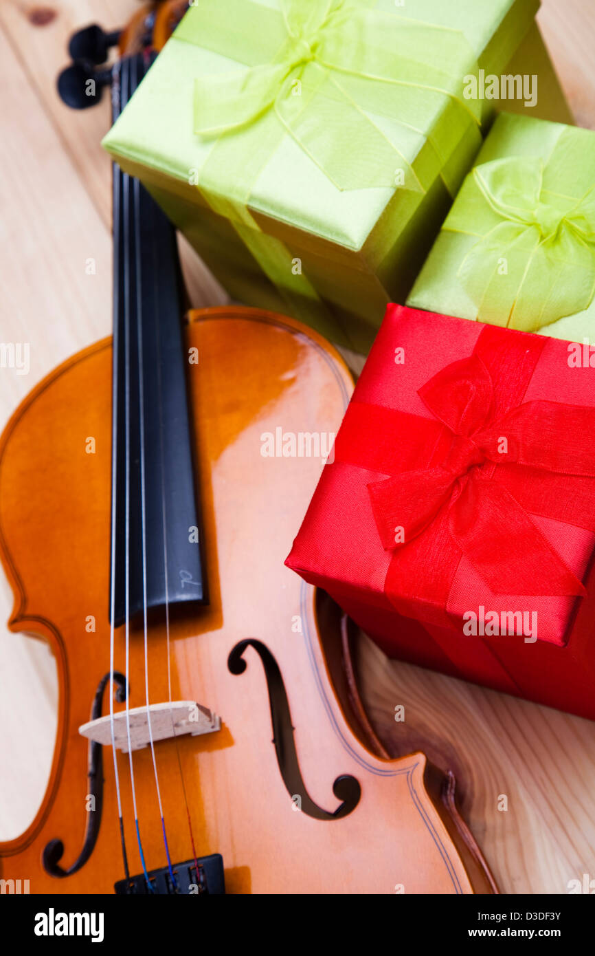 Gift and violin Stock Photo - Alamy