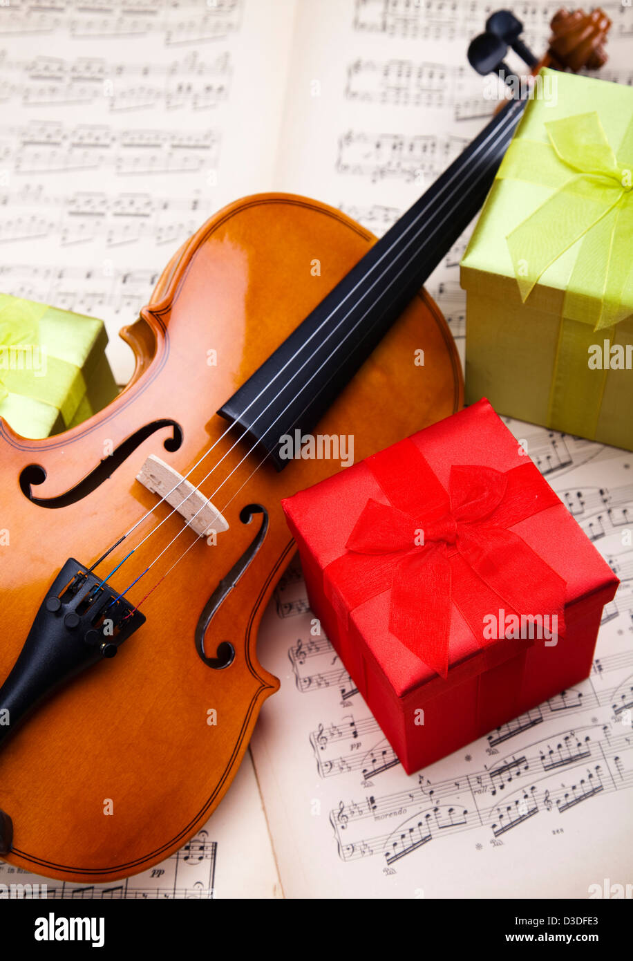 Gift and violin Stock Photo - Alamy