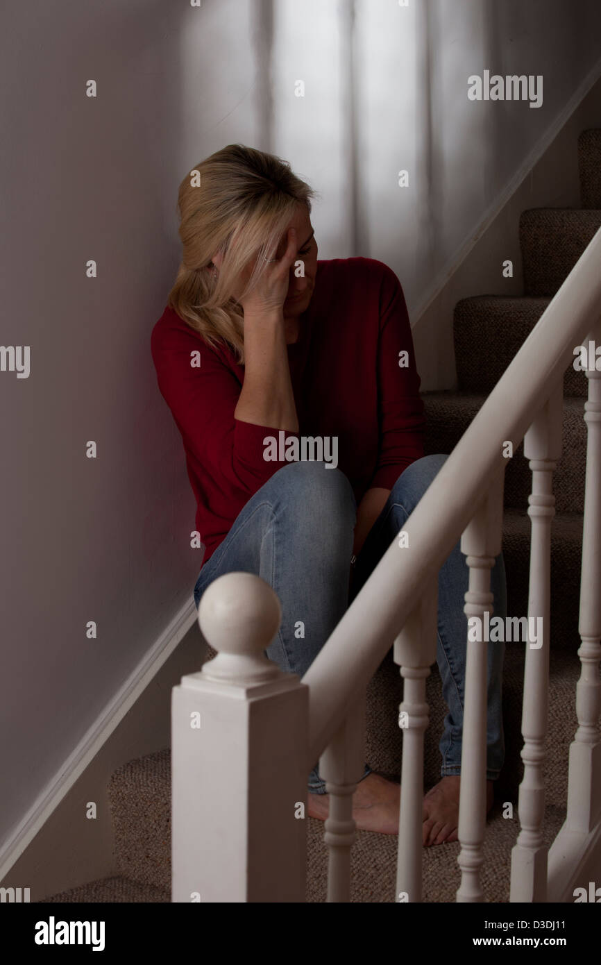 Woman slumped forward hi-res stock photography and images - Alamy