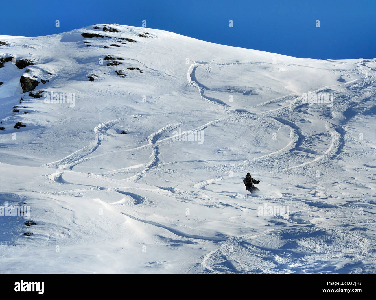Off piste snowboarder hi-res stock photography and images - Alamy