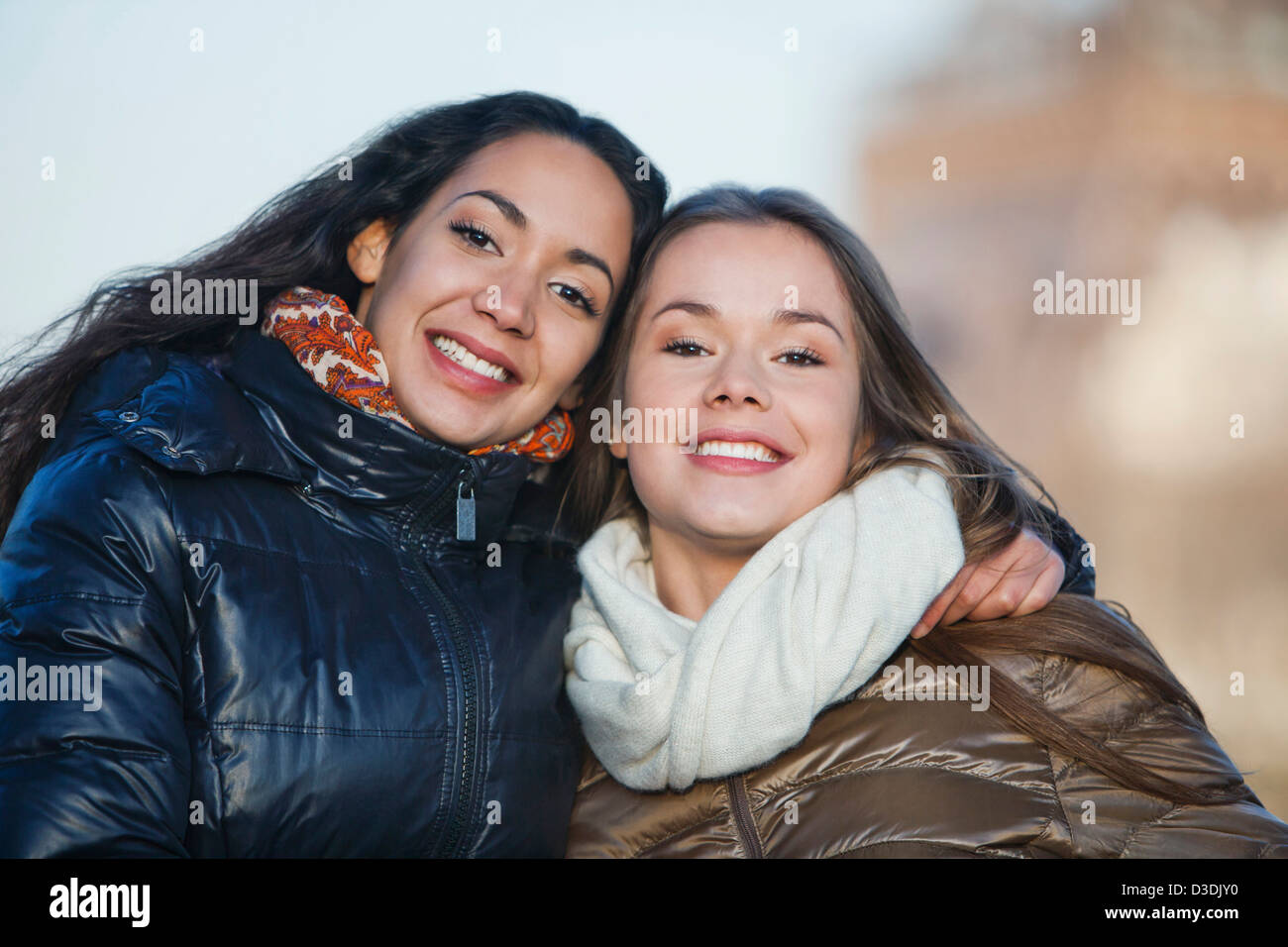 Portrait of two women smiling Stock Photo - Alamy