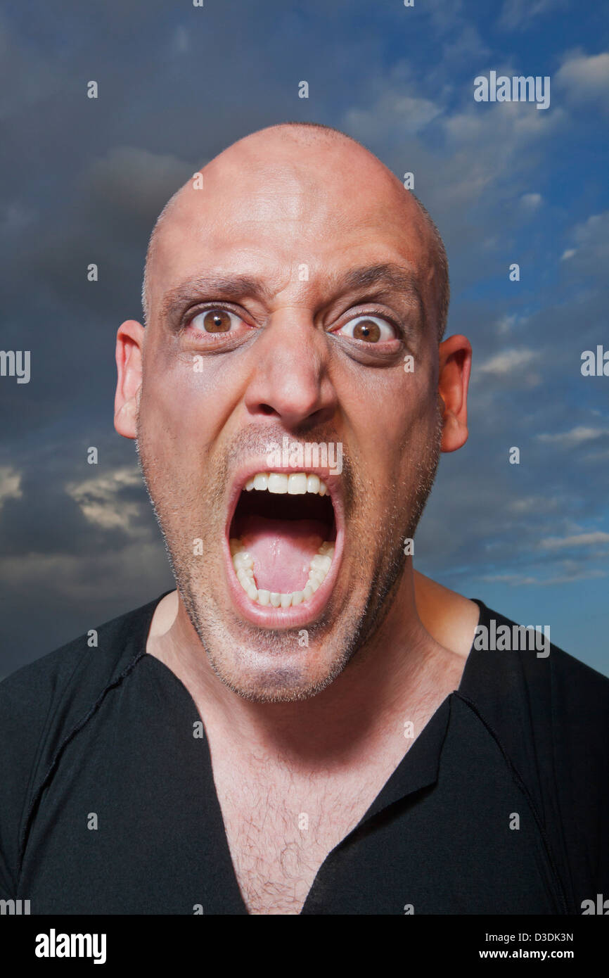 Portrait of a man shouting Stock Photo - Alamy