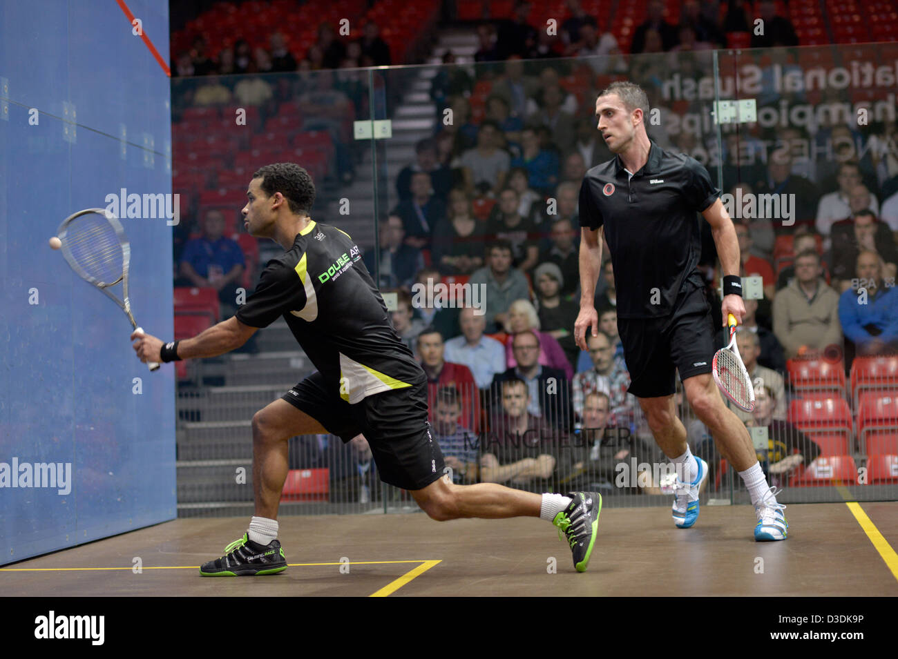 adrian grant makes a backhand return during his quarter-final match ...