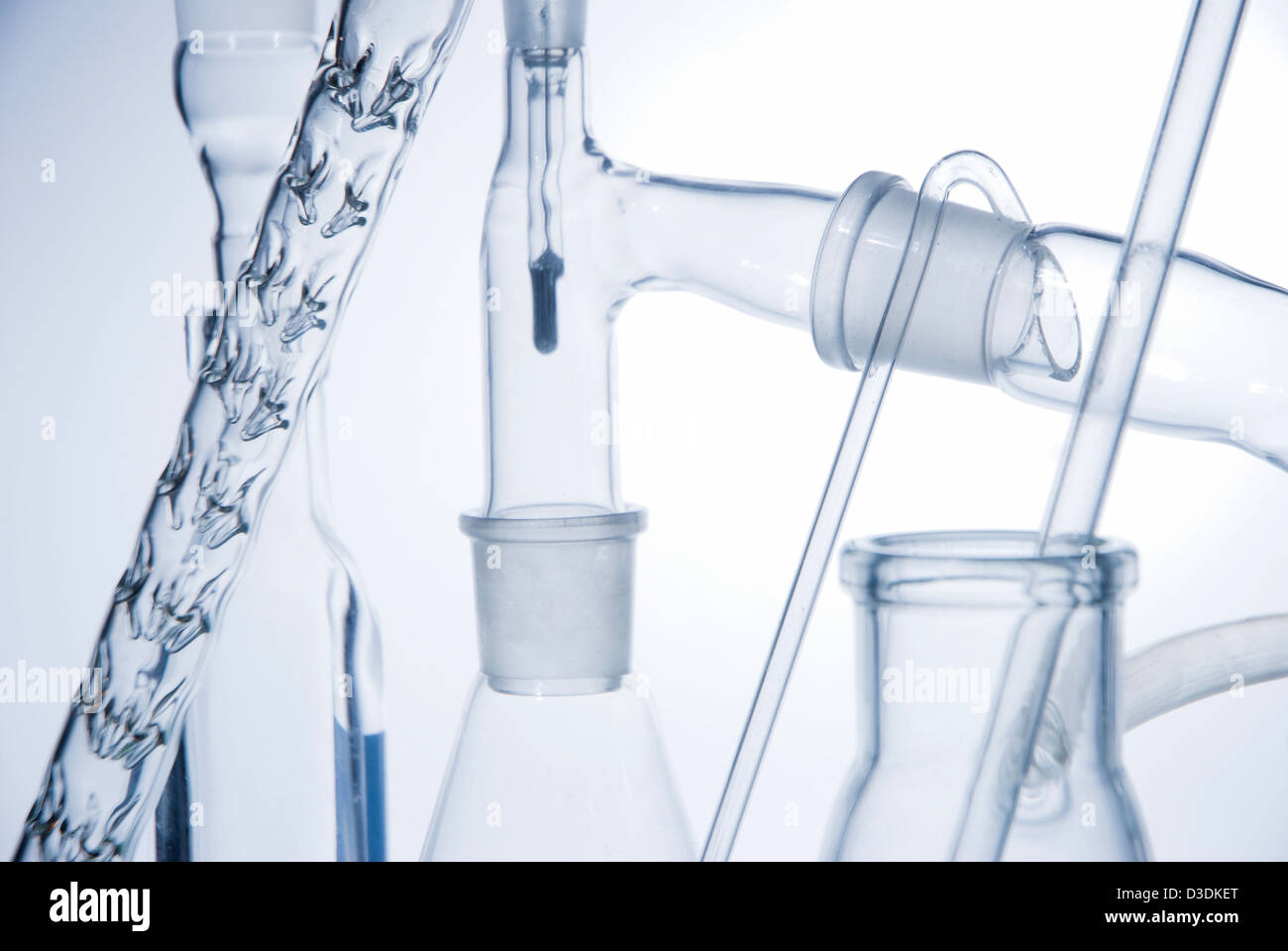 Laboratory glassware over white background Stock Photo - Alamy