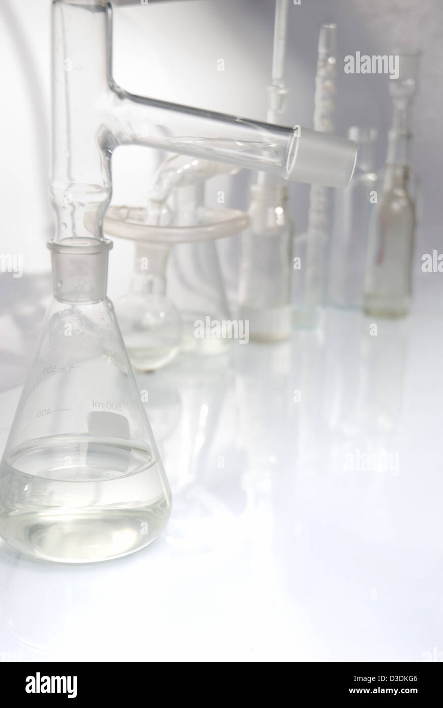 Laboratory glassware over white background Stock Photo - Alamy