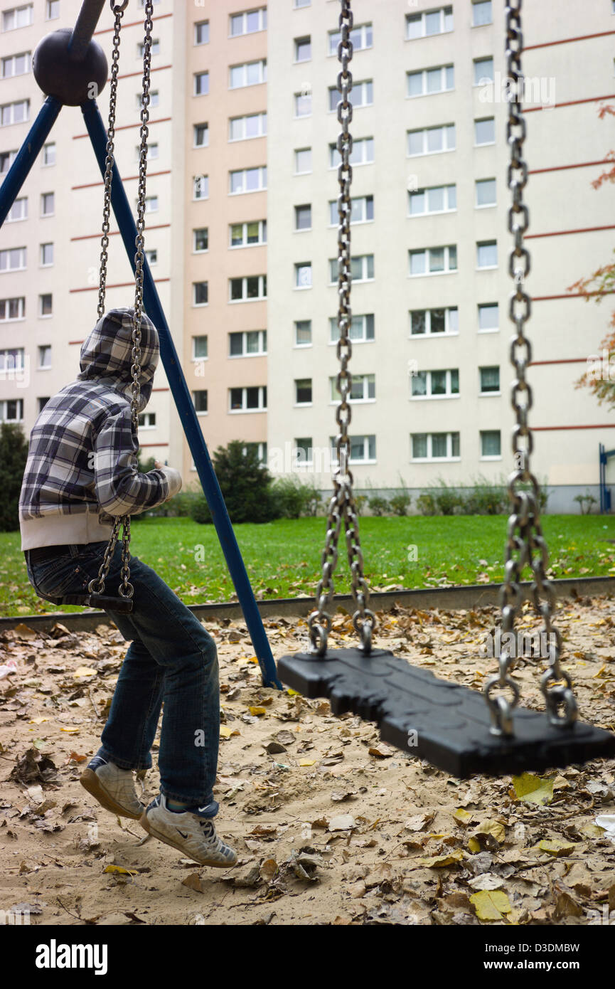 Berlin, Germany, a girl alone on a swing in Marzahn-Hellersdorf Stock ...