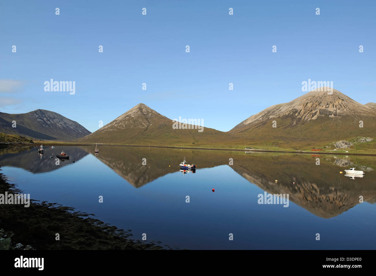 colorful boat reflections on loch slapin, isle of skye, scotland Stock ...