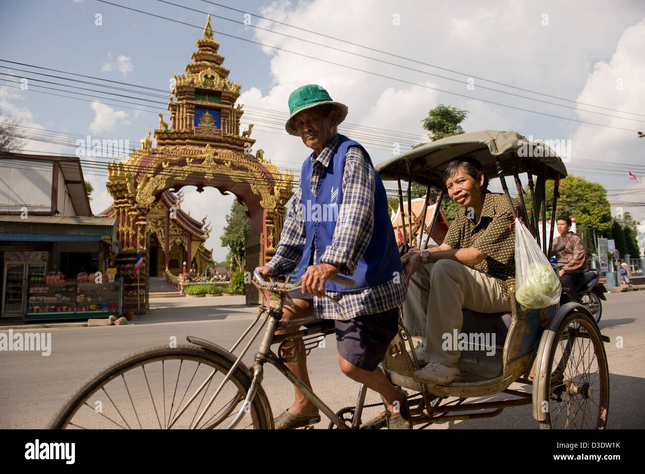 Fang, Thailand, rickshaw drivers with guest front of a temple Stock ...
