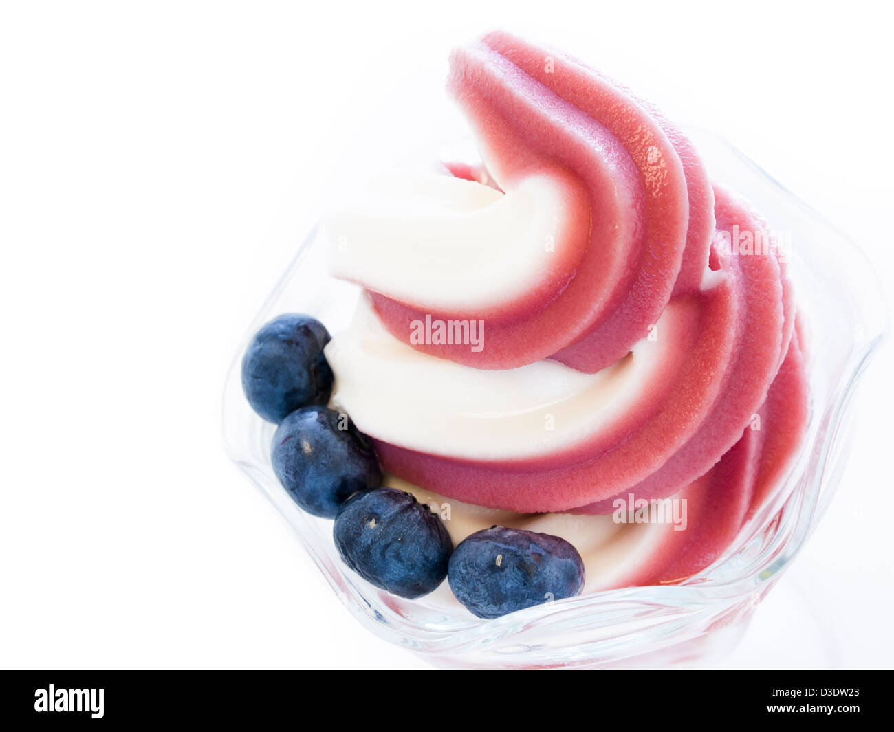 Cup of soft-serve frozen yogurt on white background Stock Photo - Alamy