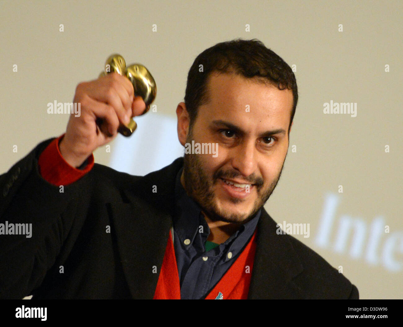 Danish-Palestinian director Mahdi Fleifel cheers after receiving the ...