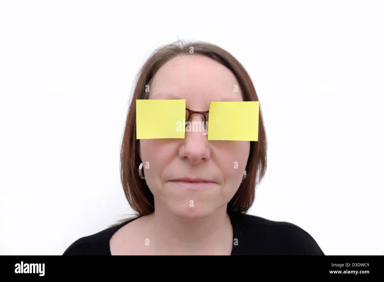 woman with yellow post it notes stuck onto her glasses Stock Photo - Alamy